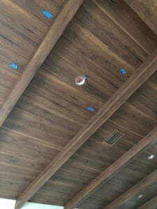 Vaulted ceiling beams with laminate wood - Jenna Sue Design