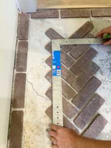 How to install herringbone brick floor tile - Jenna Sue Design