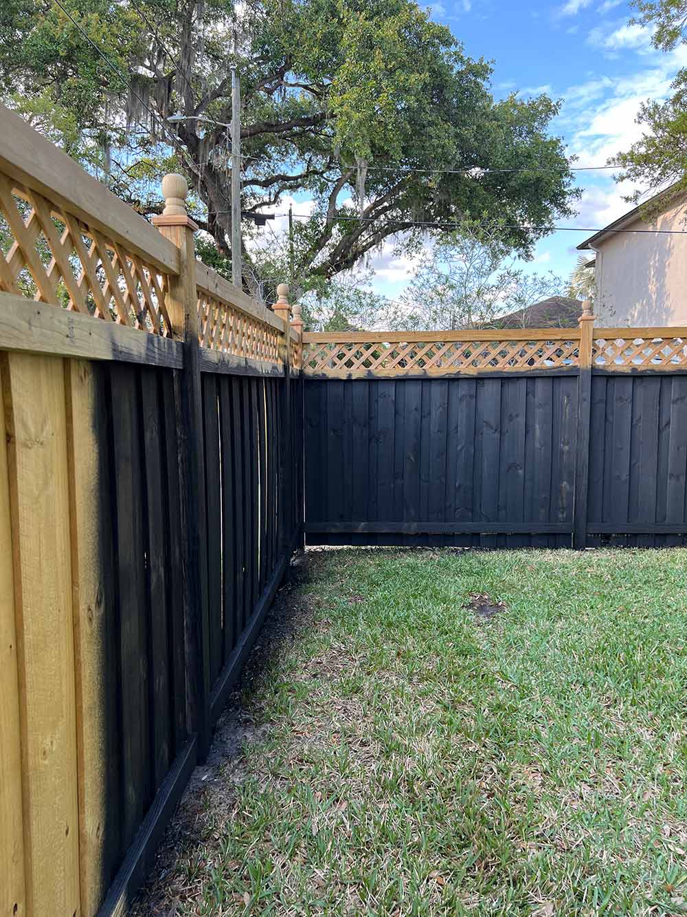 Black wood fence and DIY arbor reveal - Jenna Sue Design