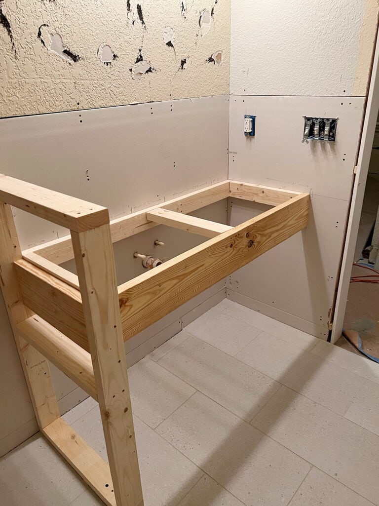 Custom built in bathroom vanity with microcement - Jenna Sue Design